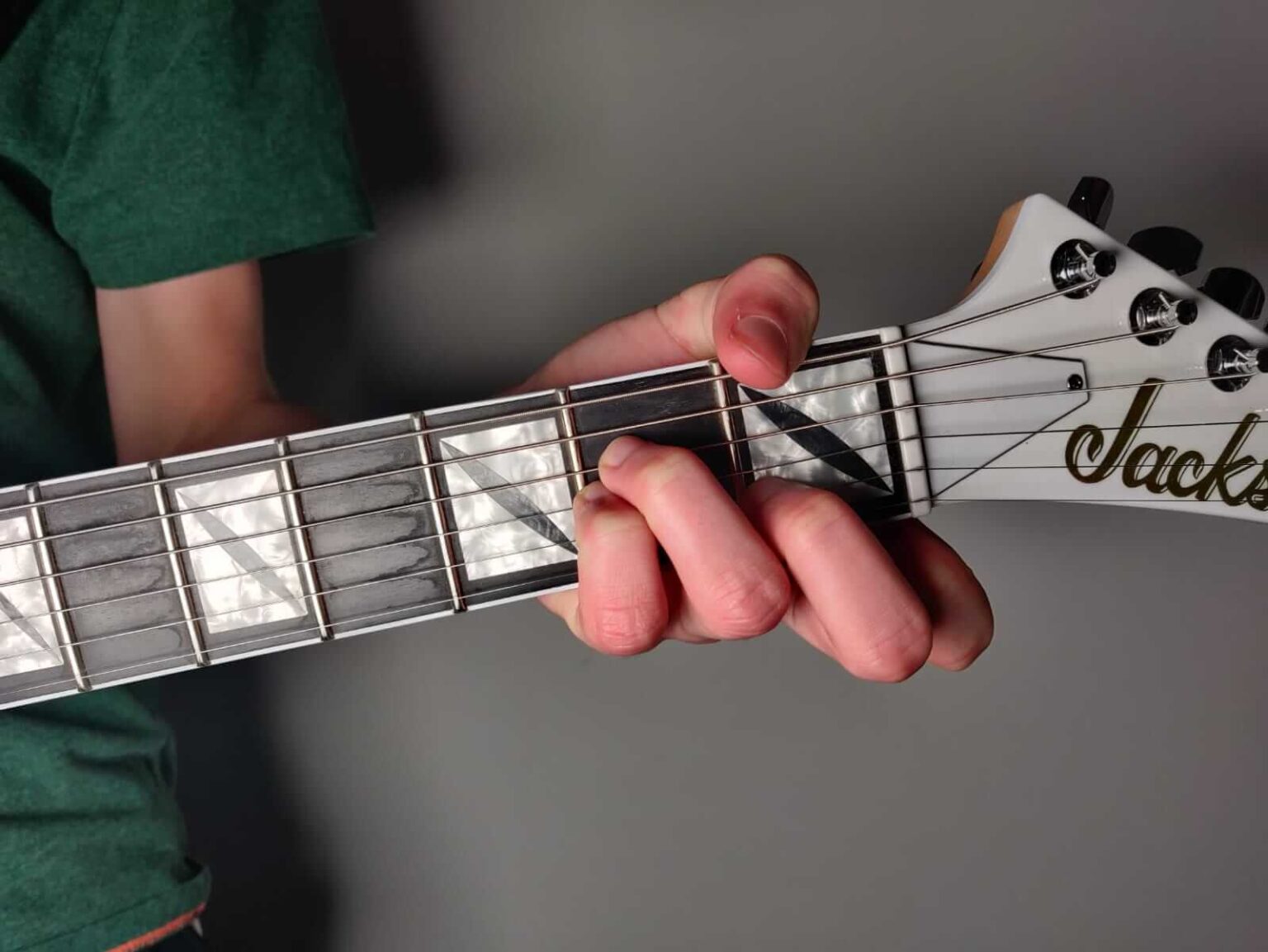 5 Easy Ways to Play an F Minor Chord on Guitar - Beast Mode Guitar